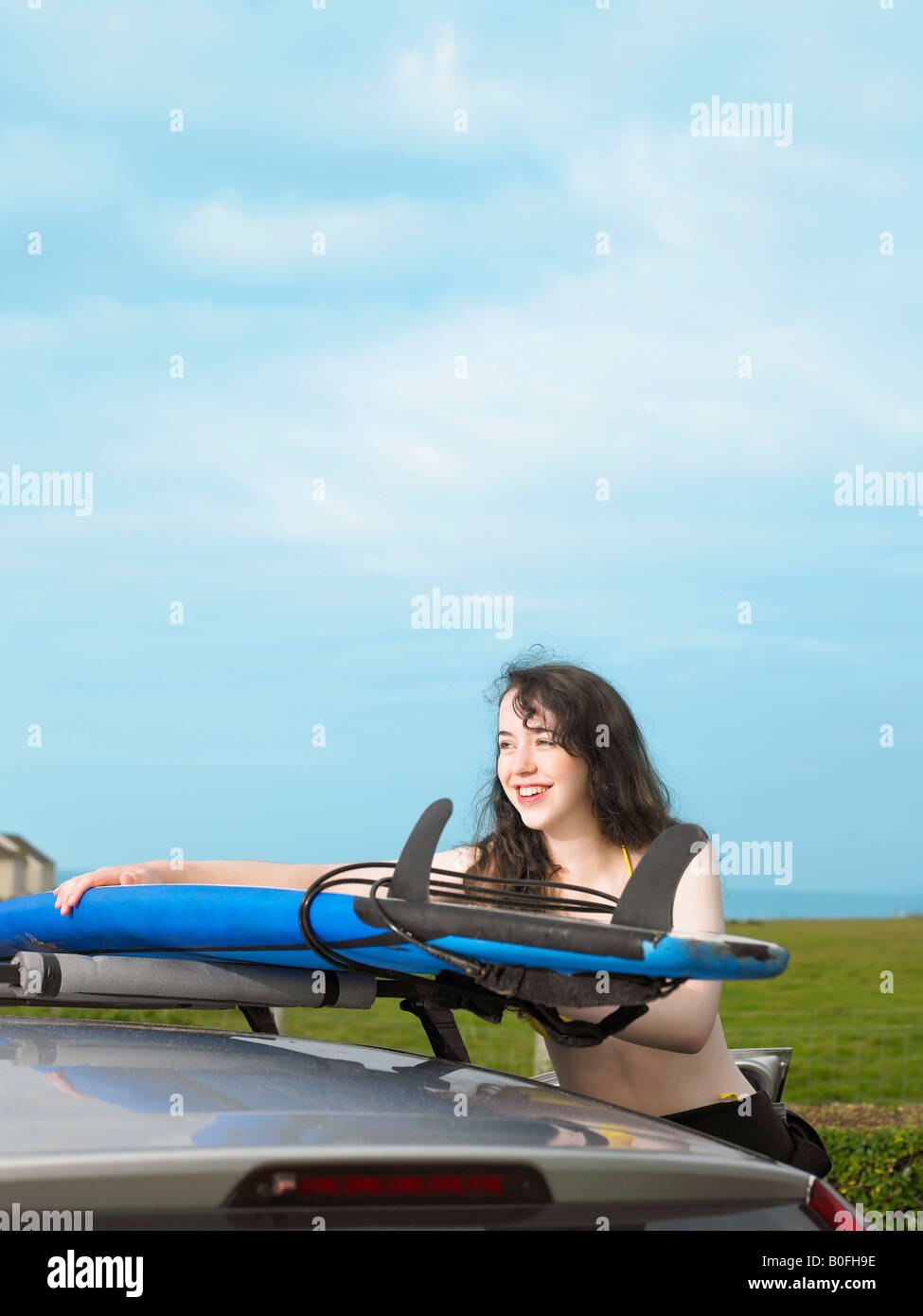 Athletic woman taking off hi-res stock photography and images - Alamy