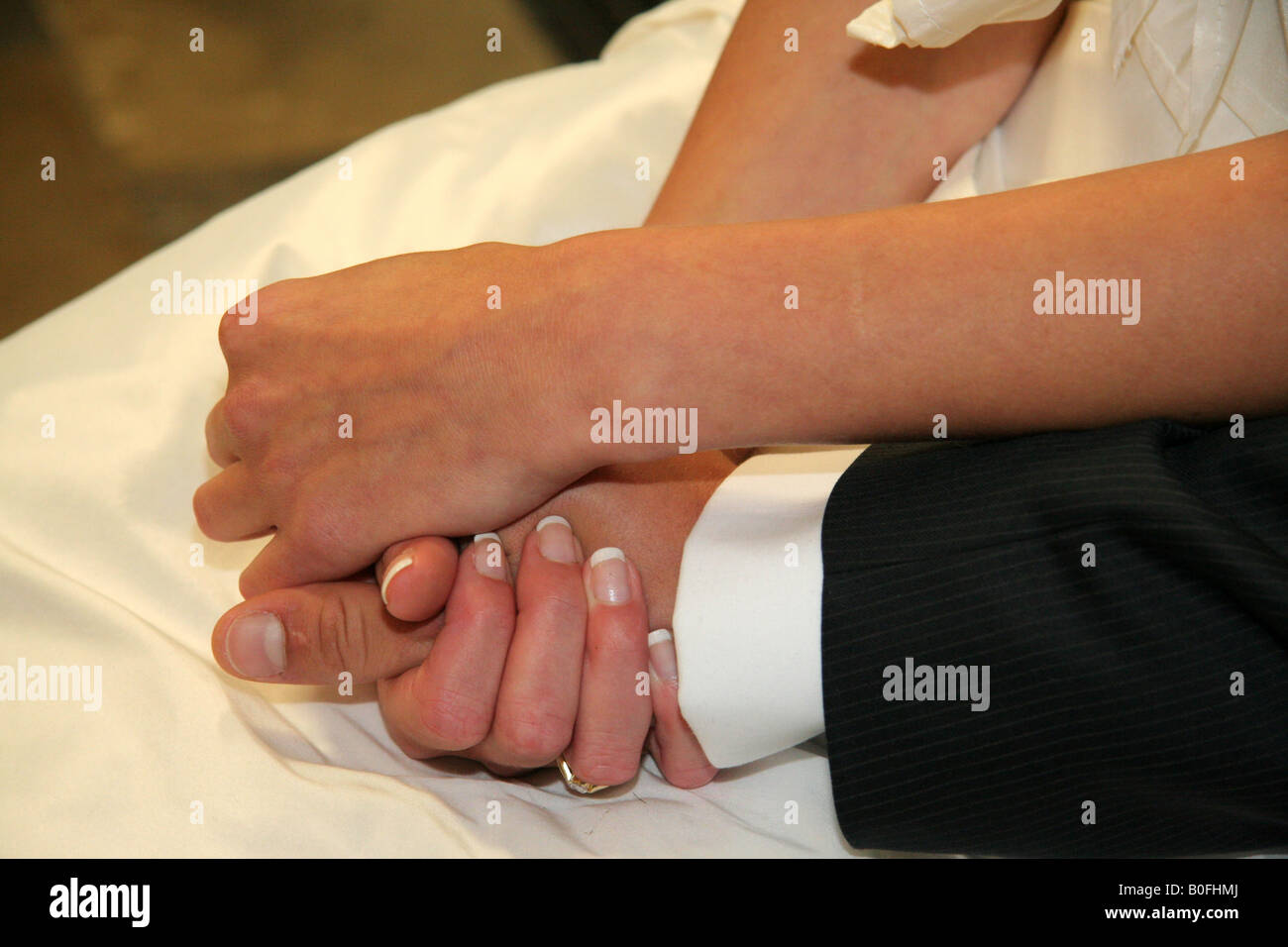 Wedding ceremony - couple's hands Stock Photo - Alamy