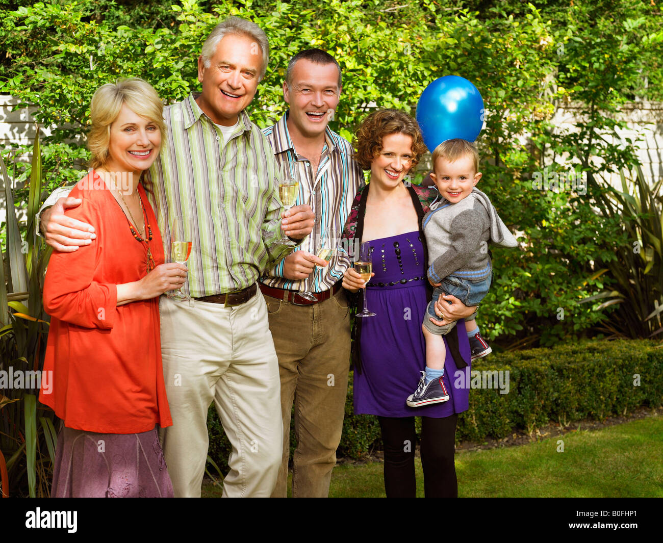 Portrait of three generations of family Stock Photo - Alamy