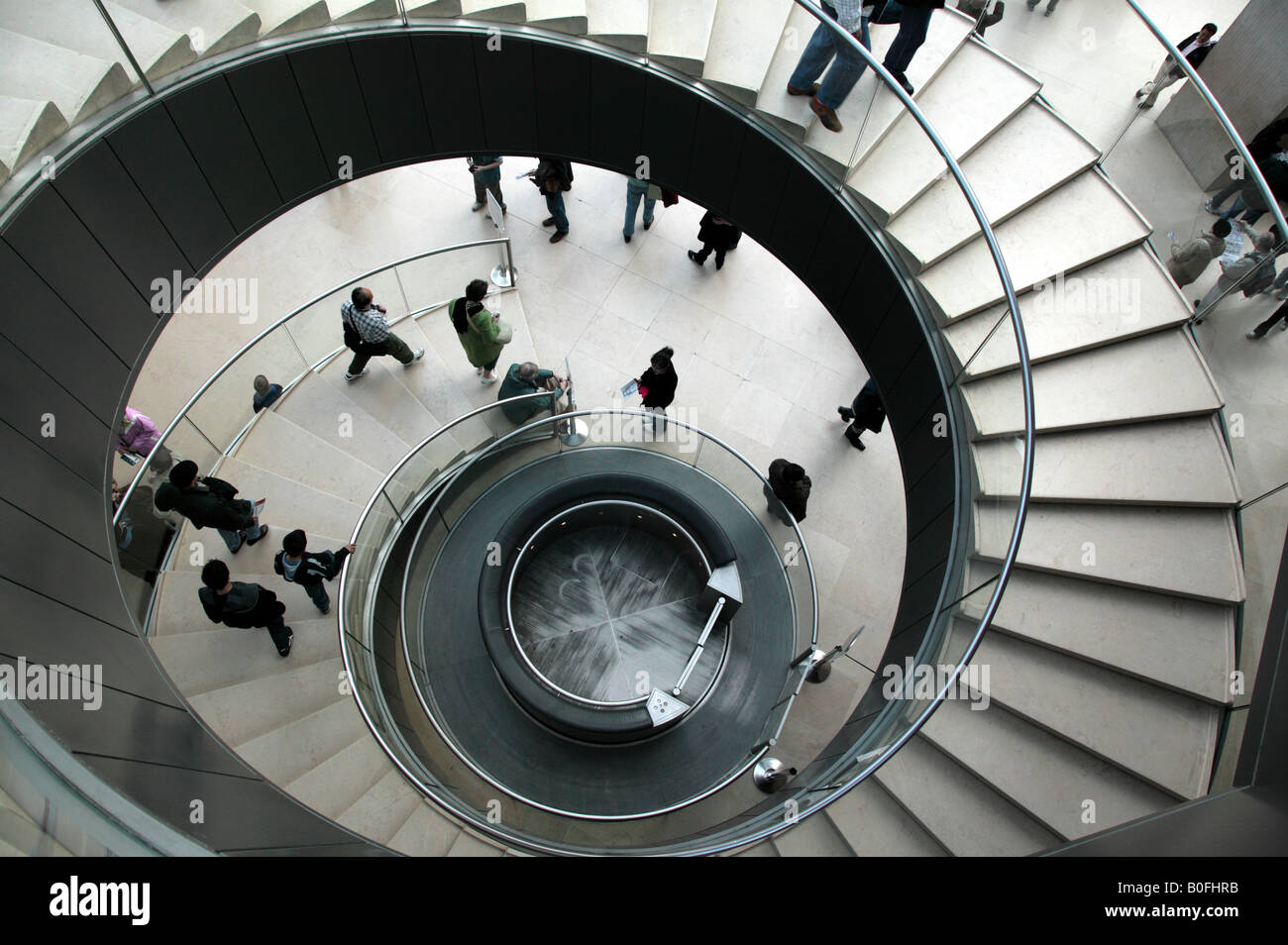 The Spiral Staircase and access lift to the central lobby of the Louvre ...