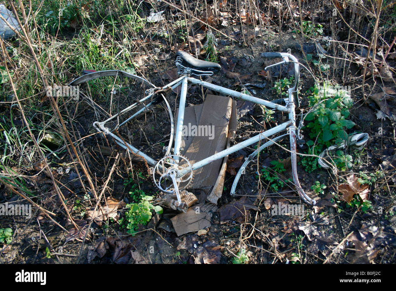 damaged bike frame in field Stock Photo - Alamy