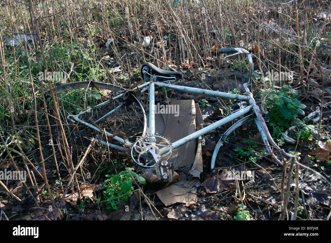 damaged bike frame in field Stock Photo - Alamy