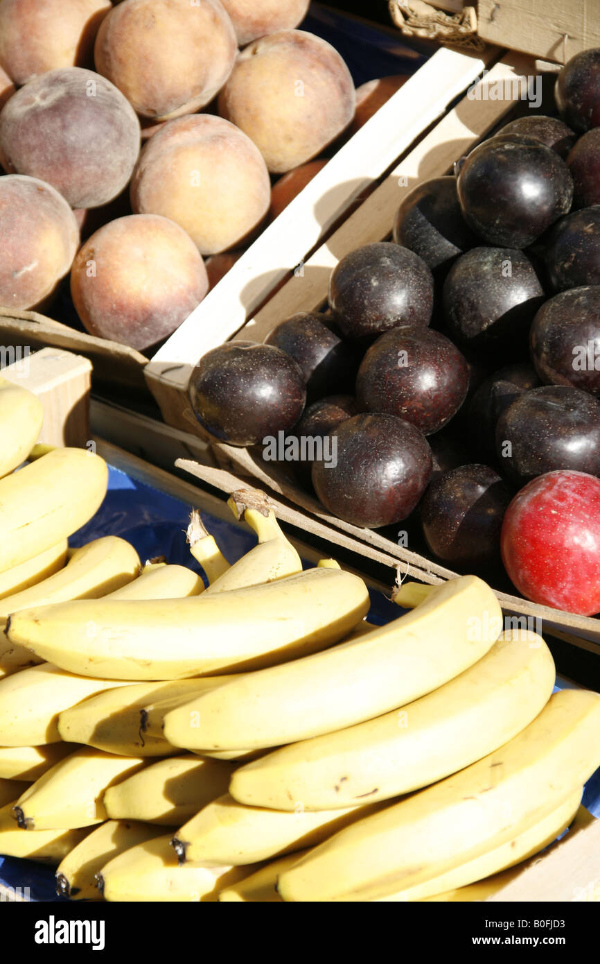 selection of fruit on sale on market stall in sun Stock Photo - Alamy