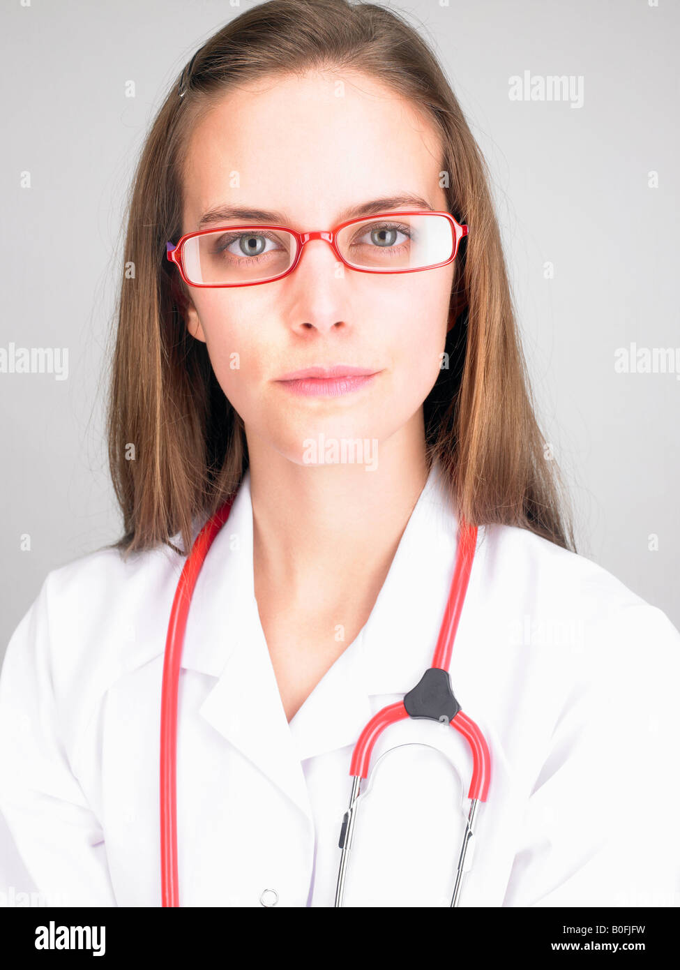 Doctor woman looking into the camera Stock Photo - Alamy