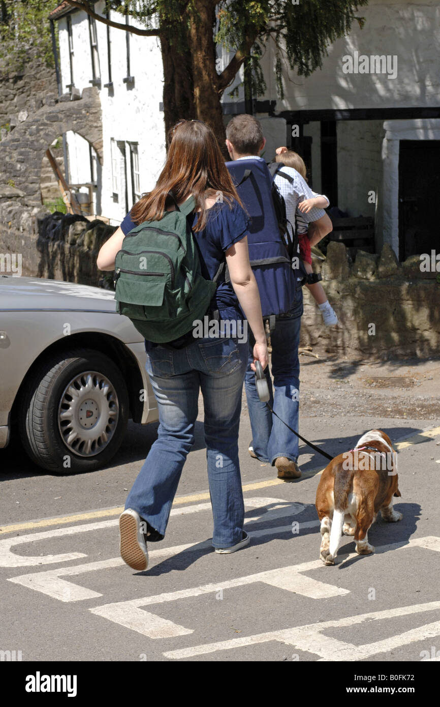 View of two people wearing modern backpacks on a family day out Stock ...