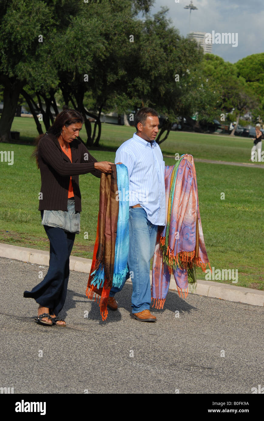 These Romany Gypsies get busy to approach a coach load of visiting ...