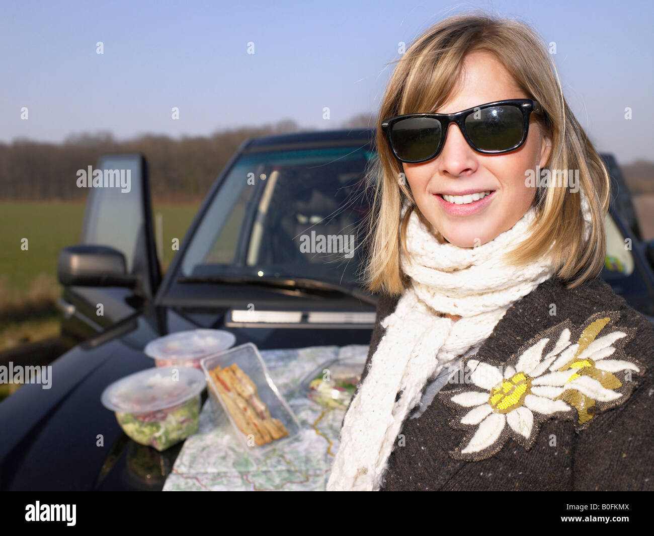 Young woman at rest stop Stock Photo - Alamy