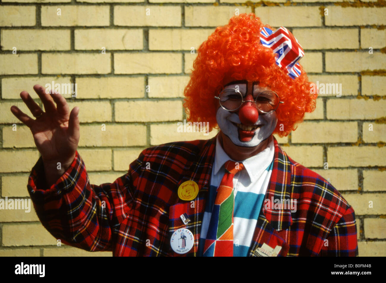 brightly coloured and dressed clown at the last clowns convention at ...