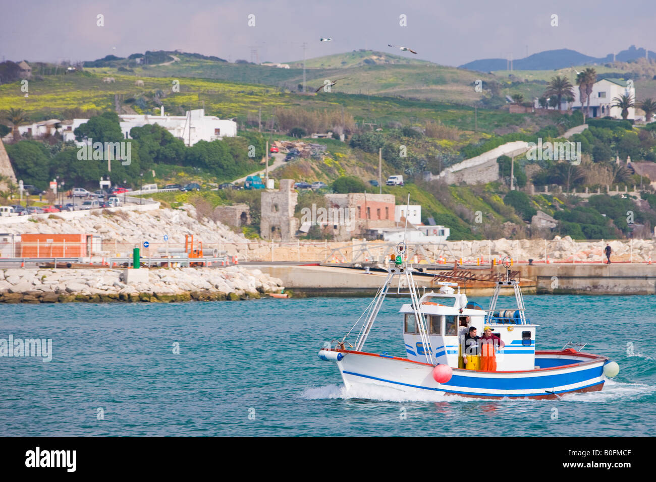 Fishing boat in boat harbour in the town of Tarifa, Strait of Gibraltar ...