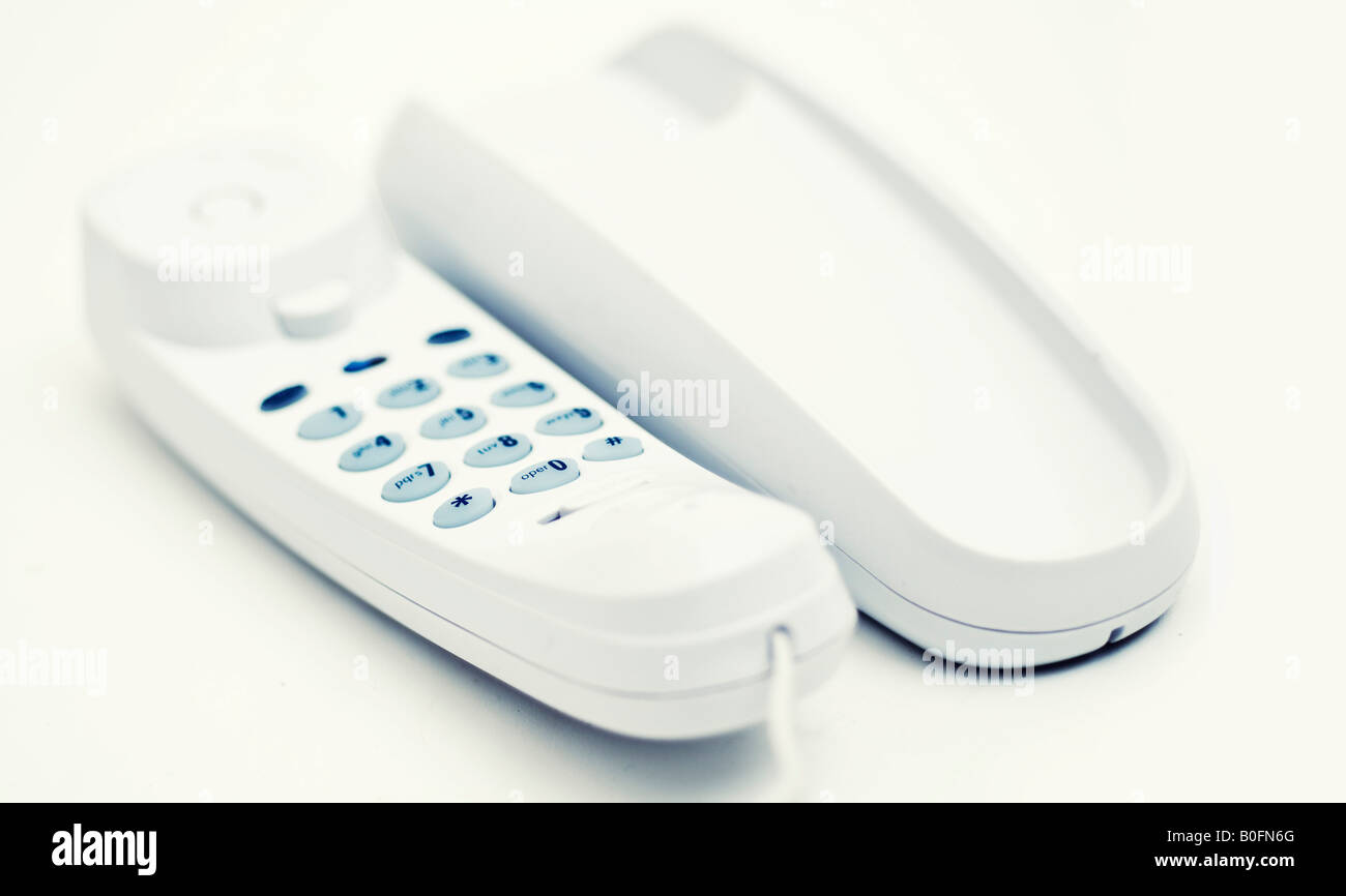 White generic phone and holder,image has been cross processed Stock ...