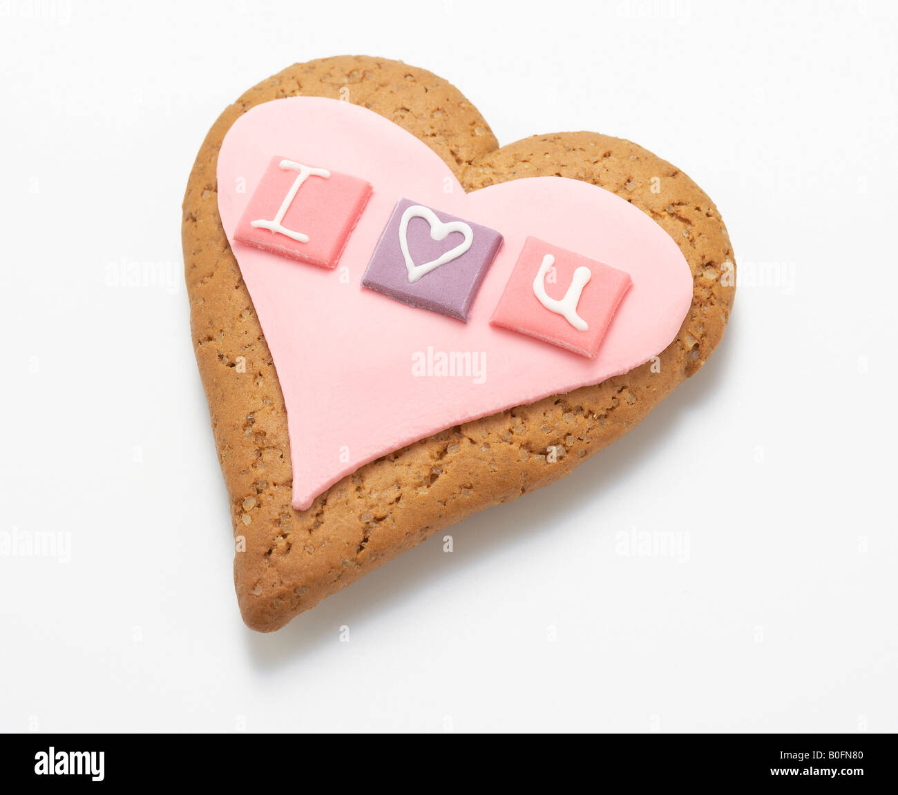 biscuit with icing heart Stock Photo - Alamy