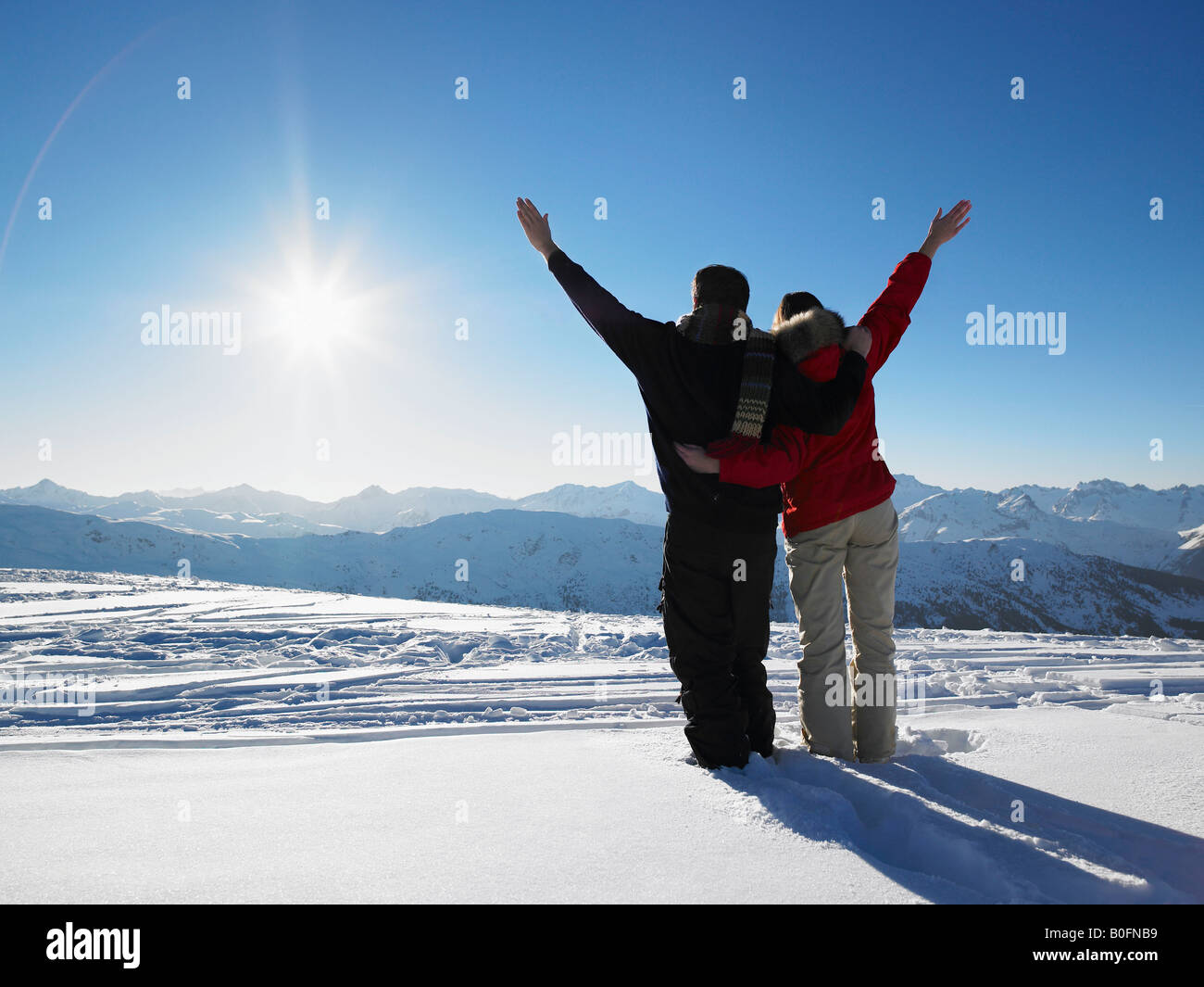 Young couple hugging admiring view hi-res stock photography and images ...