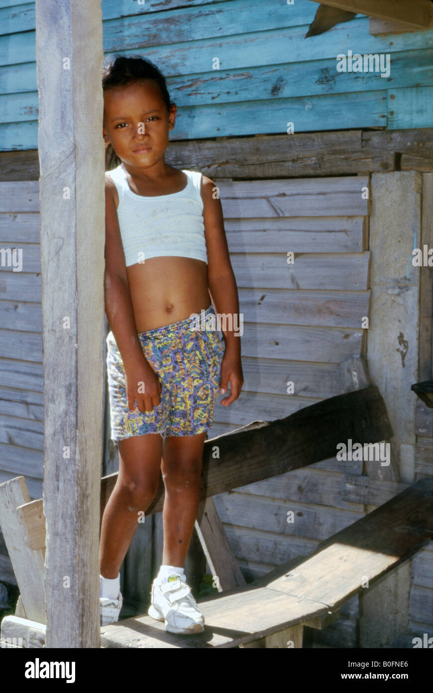 Young local girl outside of her wooden home,Roatan,Honduras Stock Photo ...