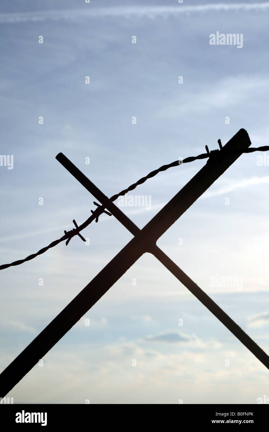 barbed wire defence barrier outdoors by sea Stock Photo - Alamy