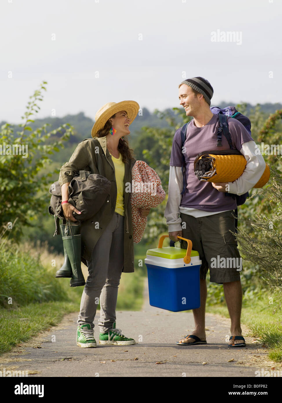 Woman and man standing on path Stock Photo - Alamy