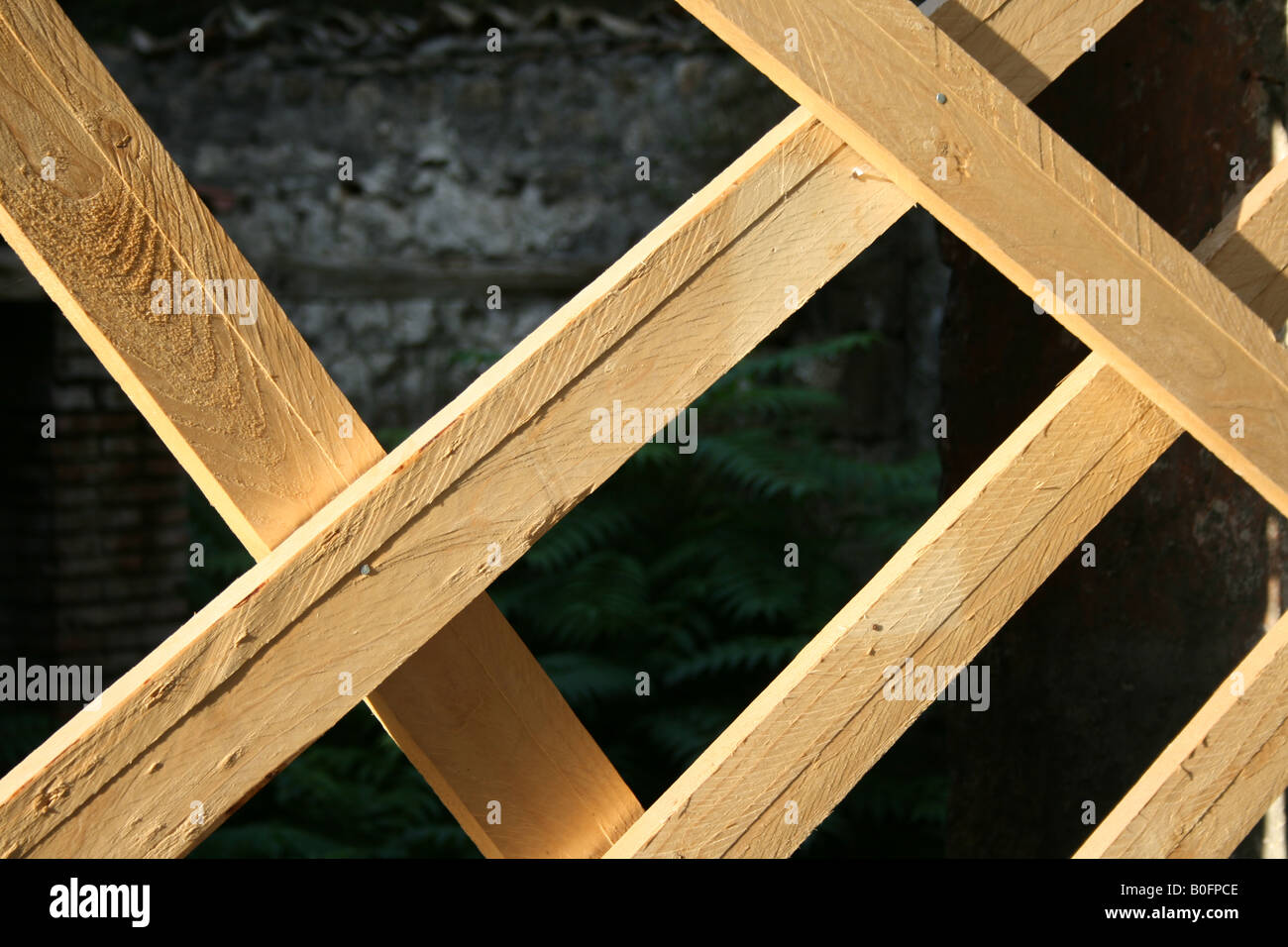 improvised temporary barrier with planks of wood Stock Photo - Alamy