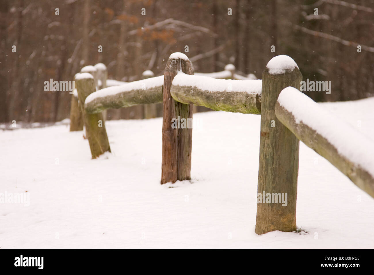 Wooden fence with snow on and around it at Fall Creek Falls State Park ...