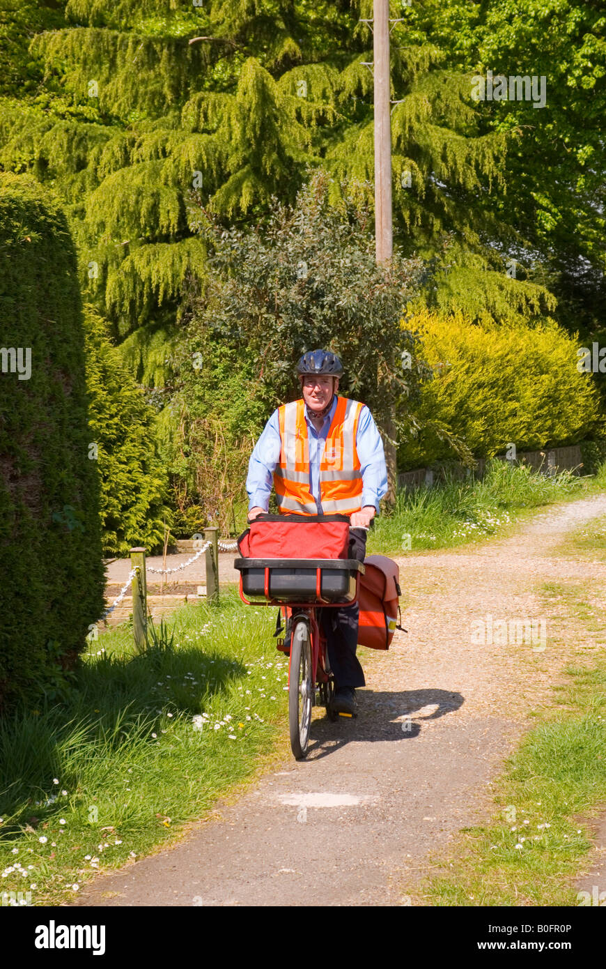 Postman with bicycle hi-res stock photography and images - Alamy