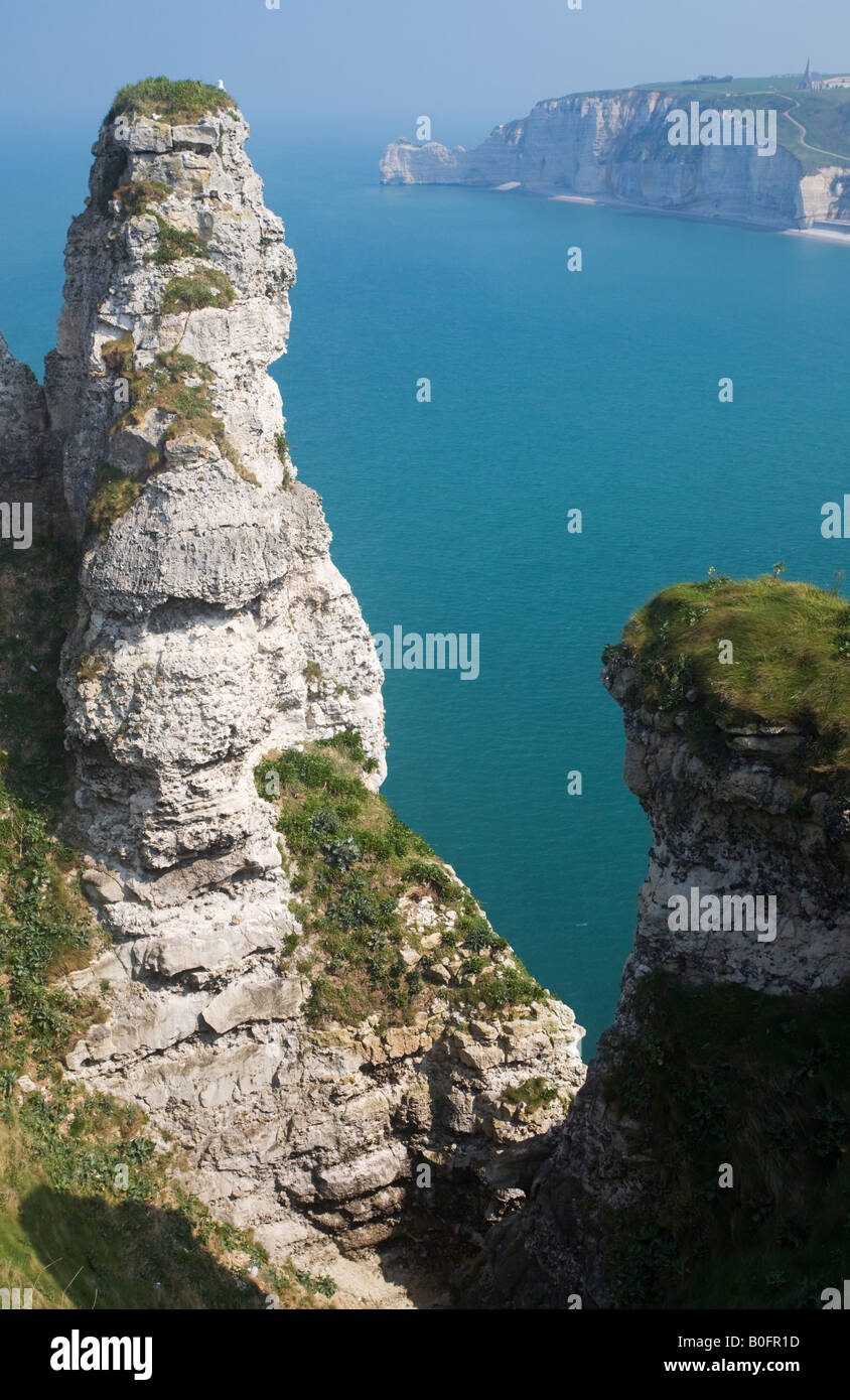 High rugged rocky crags; part of the rocks and cliffs at Etretat ...