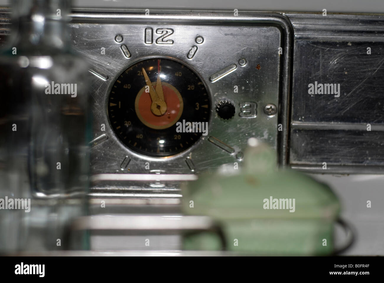 Close up of vintage stove clock Stock Photo - Alamy