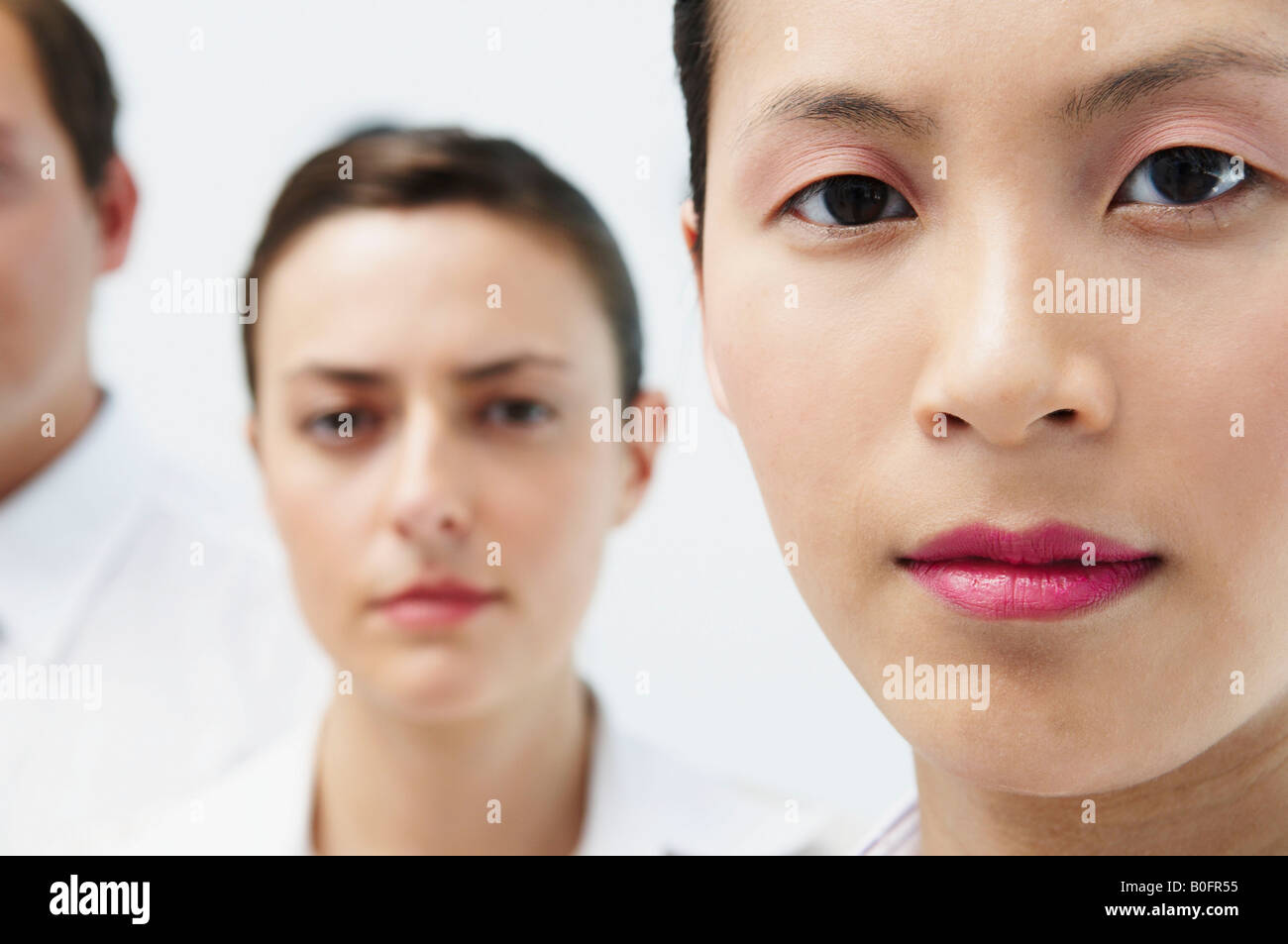 Portrait of woman, people behind Stock Photo - Alamy