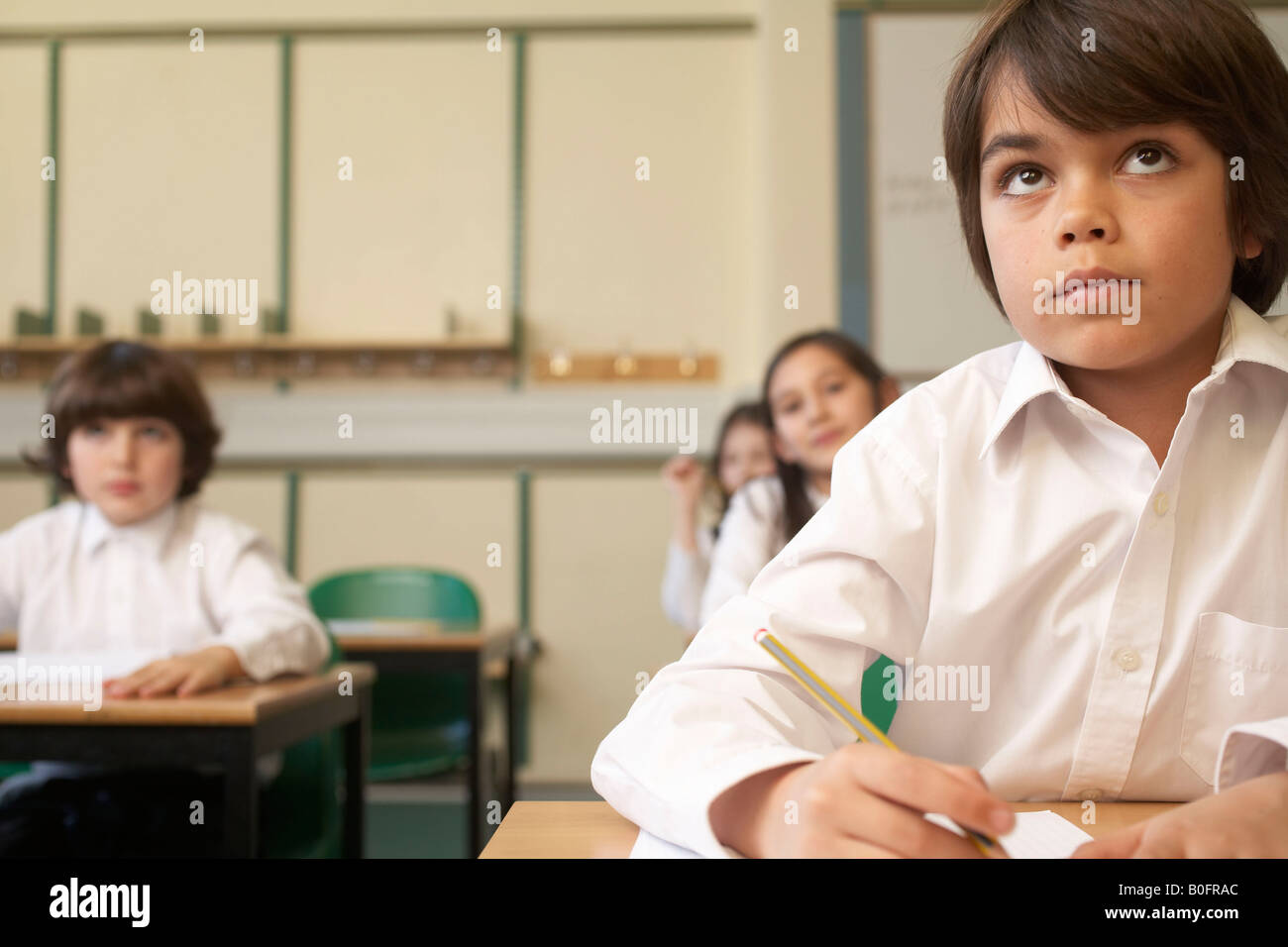 Children working in school Stock Photo - Alamy