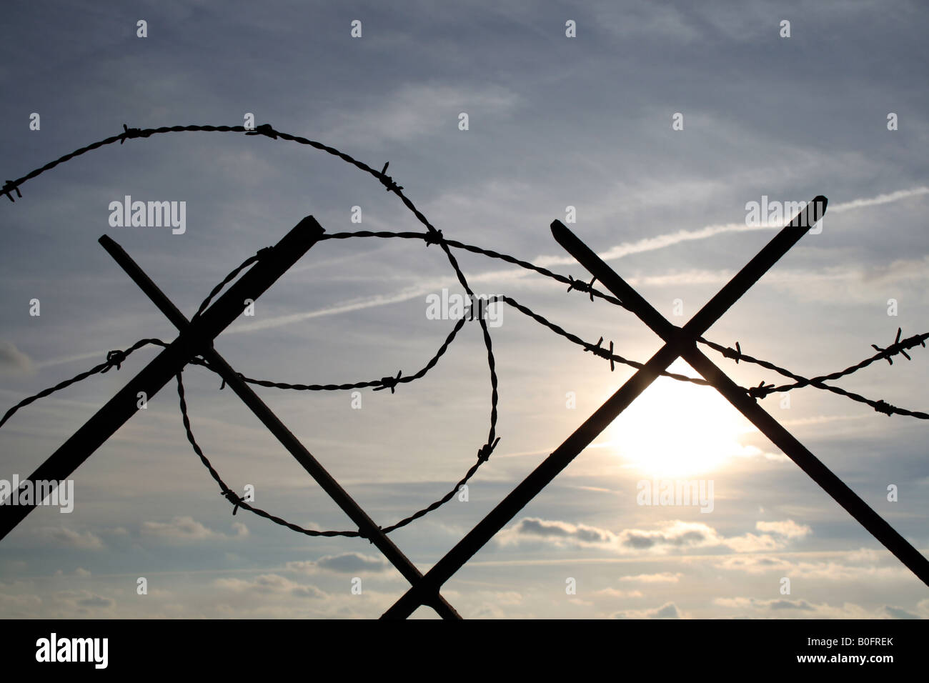 barbed wire defence barrier outdoors by sea Stock Photo - Alamy