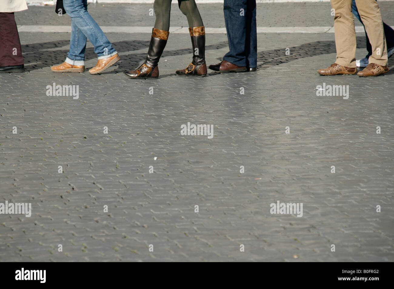 people standing in a queue in town Stock Photo - Alamy
