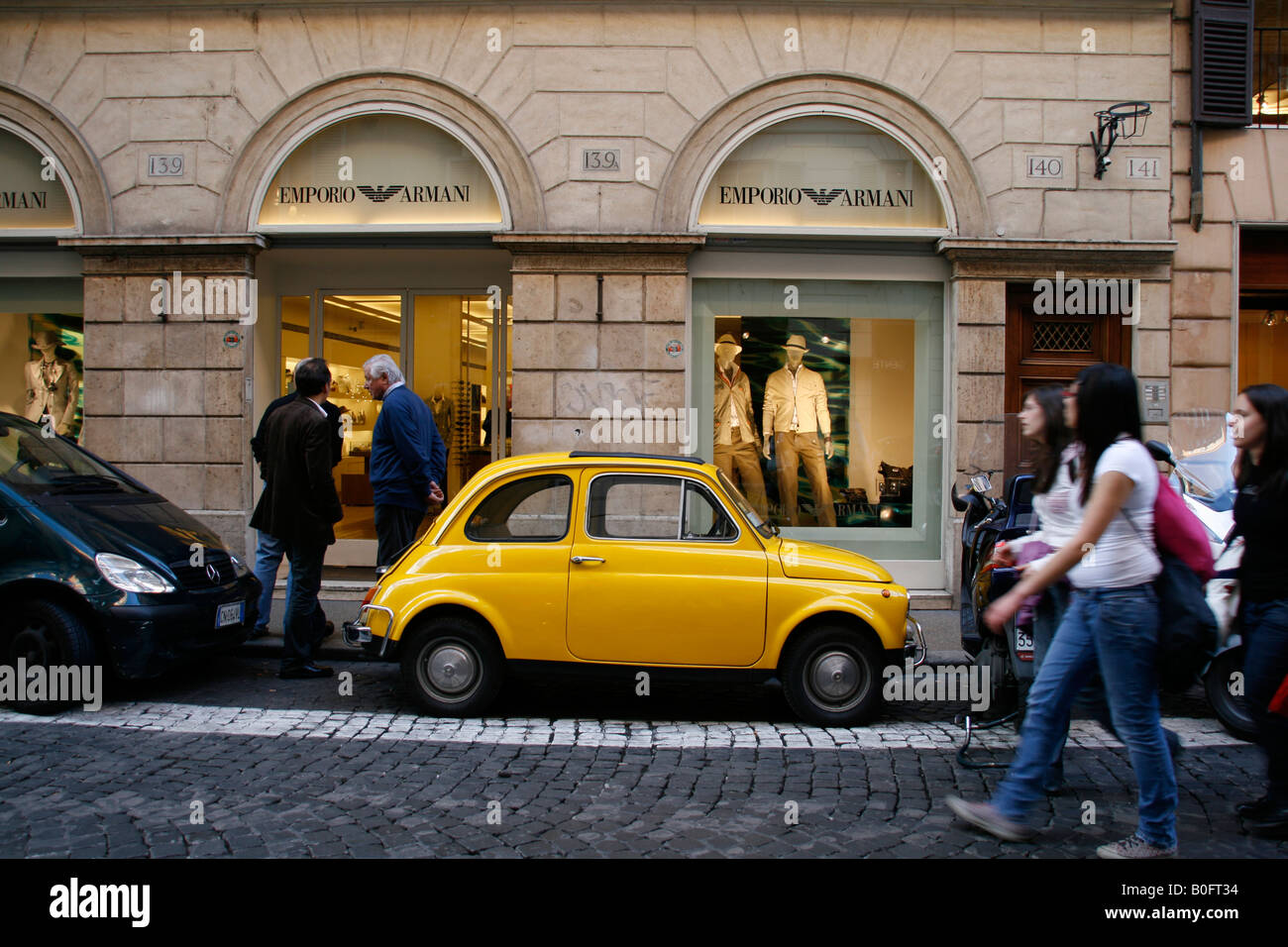 fiat 500 car and armani shop in rome Stock Photo - Alamy