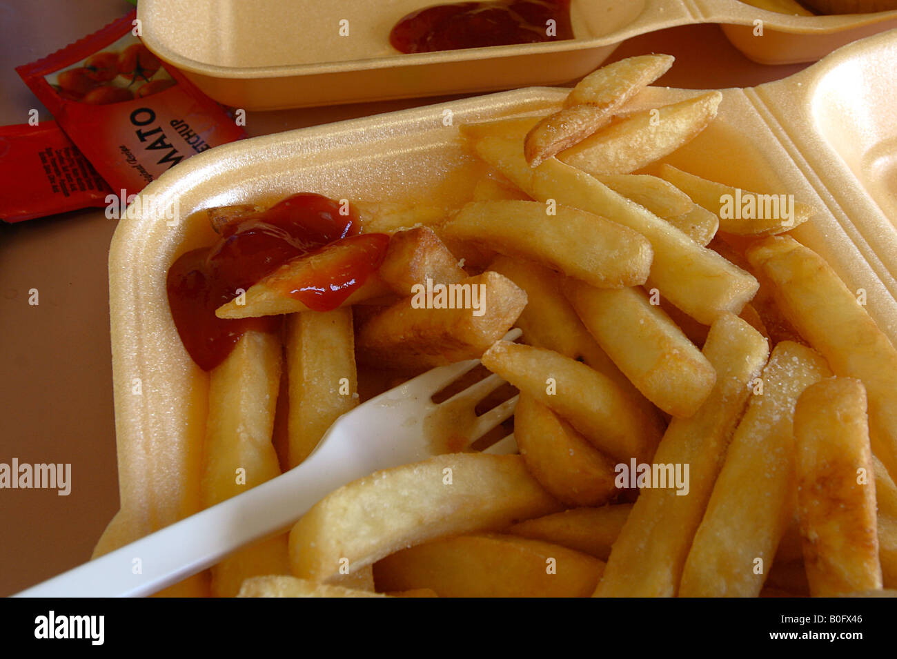 Carton of chips Stock Photo - Alamy