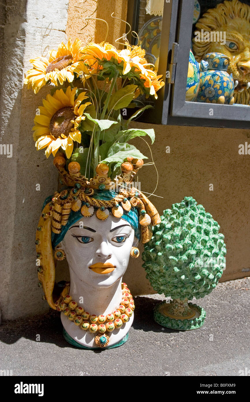 CERAMIC WOMANS HEAD AS FLOWER POT FILLED WITH SUNFLOWERS Stock Photo ...