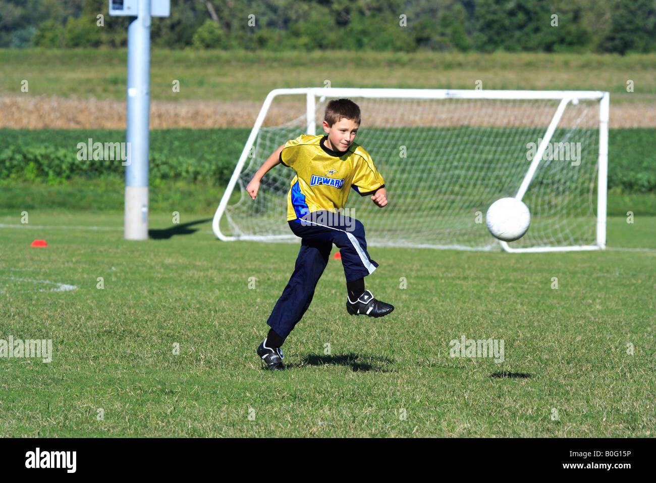 Boy Playing Soccer Stock Photo - Alamy
