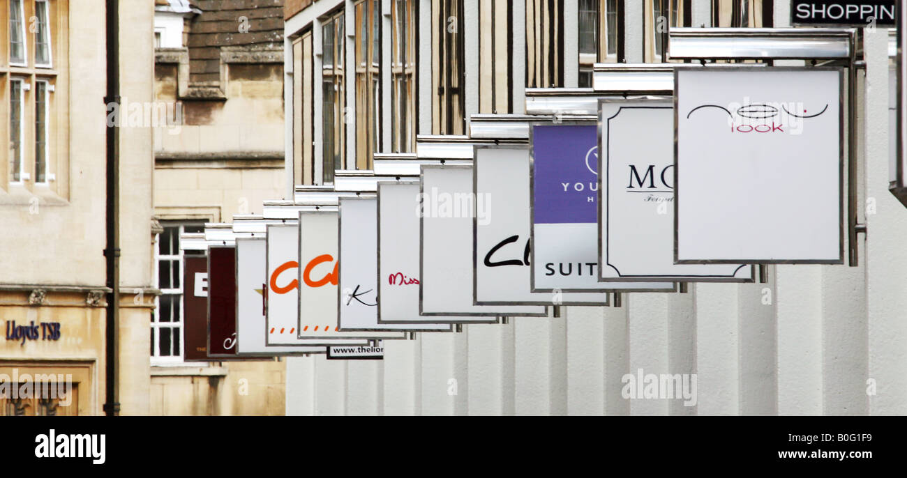 A string of shop signs in the "Lion Yard" shopping centre, Cambridge ...