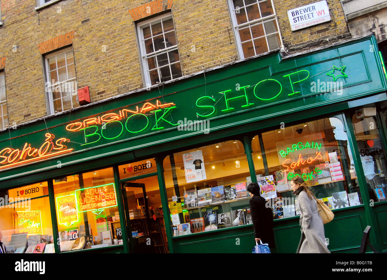 People walking past a bookshop in Soho London Stock Photo - Alamy