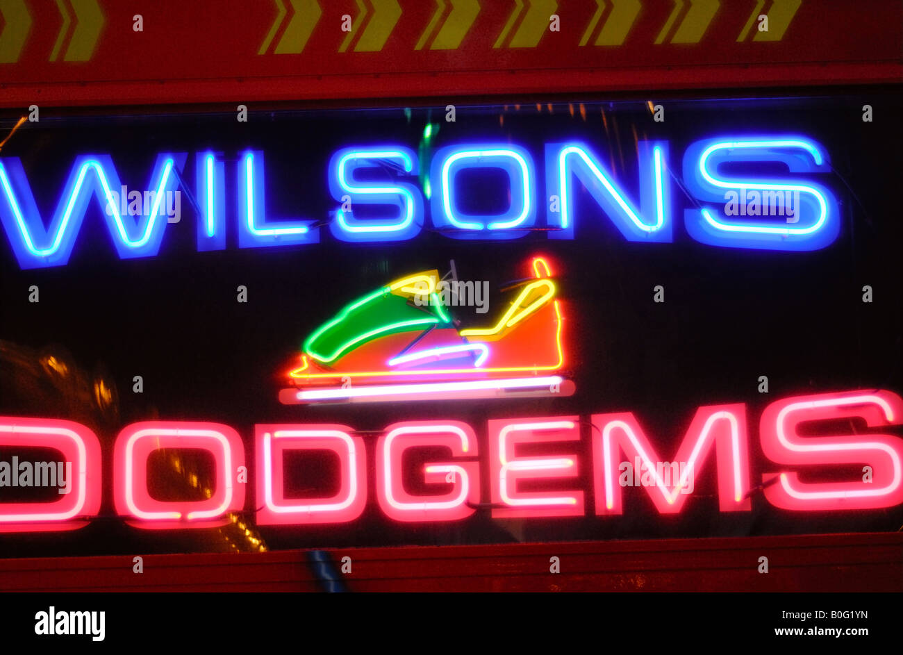 Neon sign advertising dodgem cars at an amusement park Stock Photo - Alamy