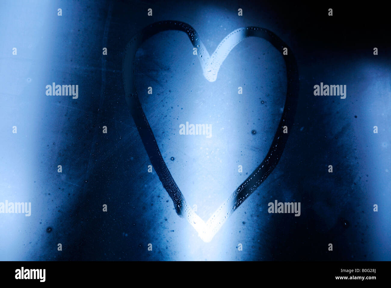 Love heart message marked with finger in a window Stock Photo - Alamy