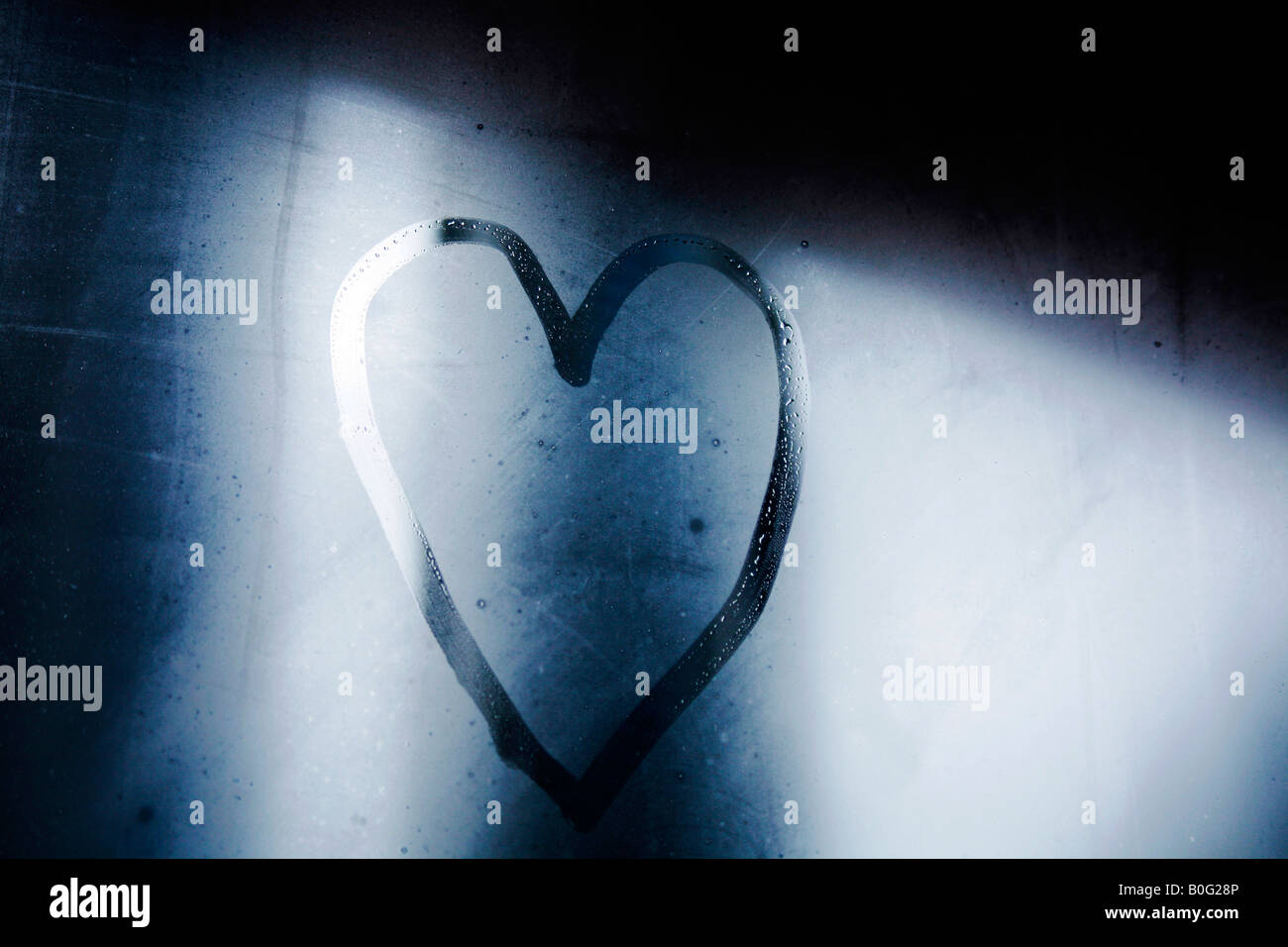 Love heart message marked with finger in a window Stock Photo - Alamy