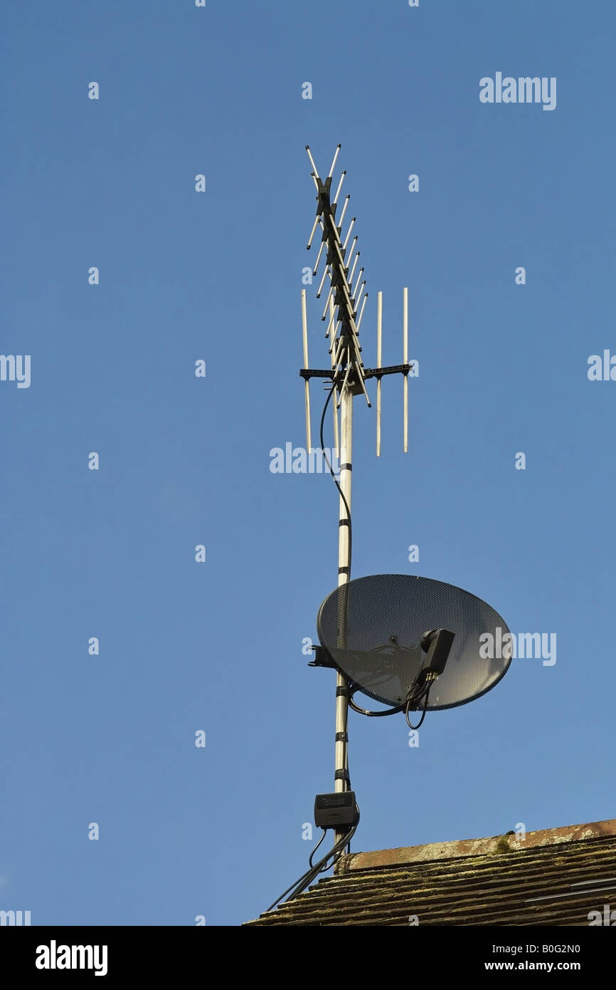 A satellite digital television arial on a roof Stock Photo - Alamy