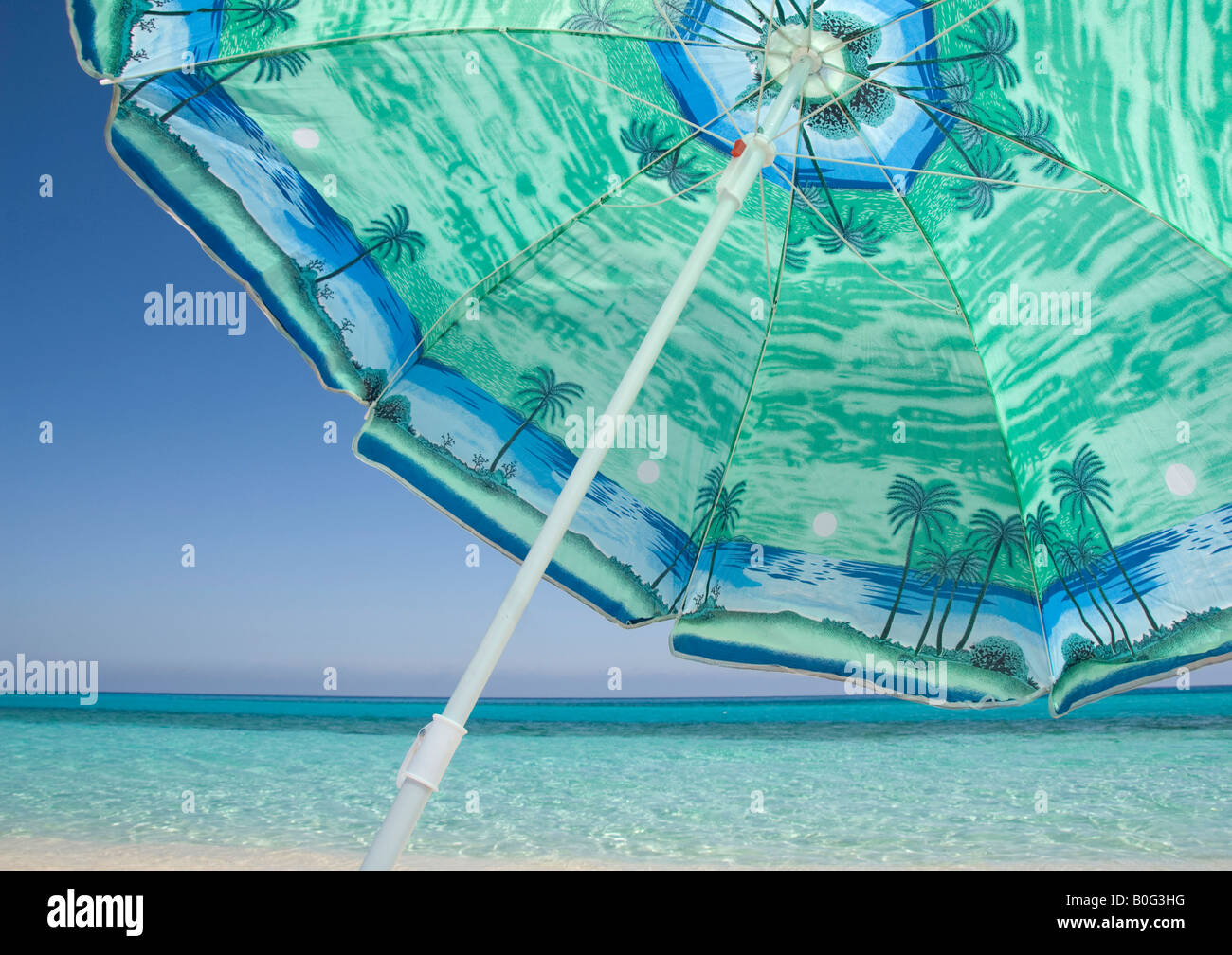 seascape with blue umbrella Stock Photo - Alamy