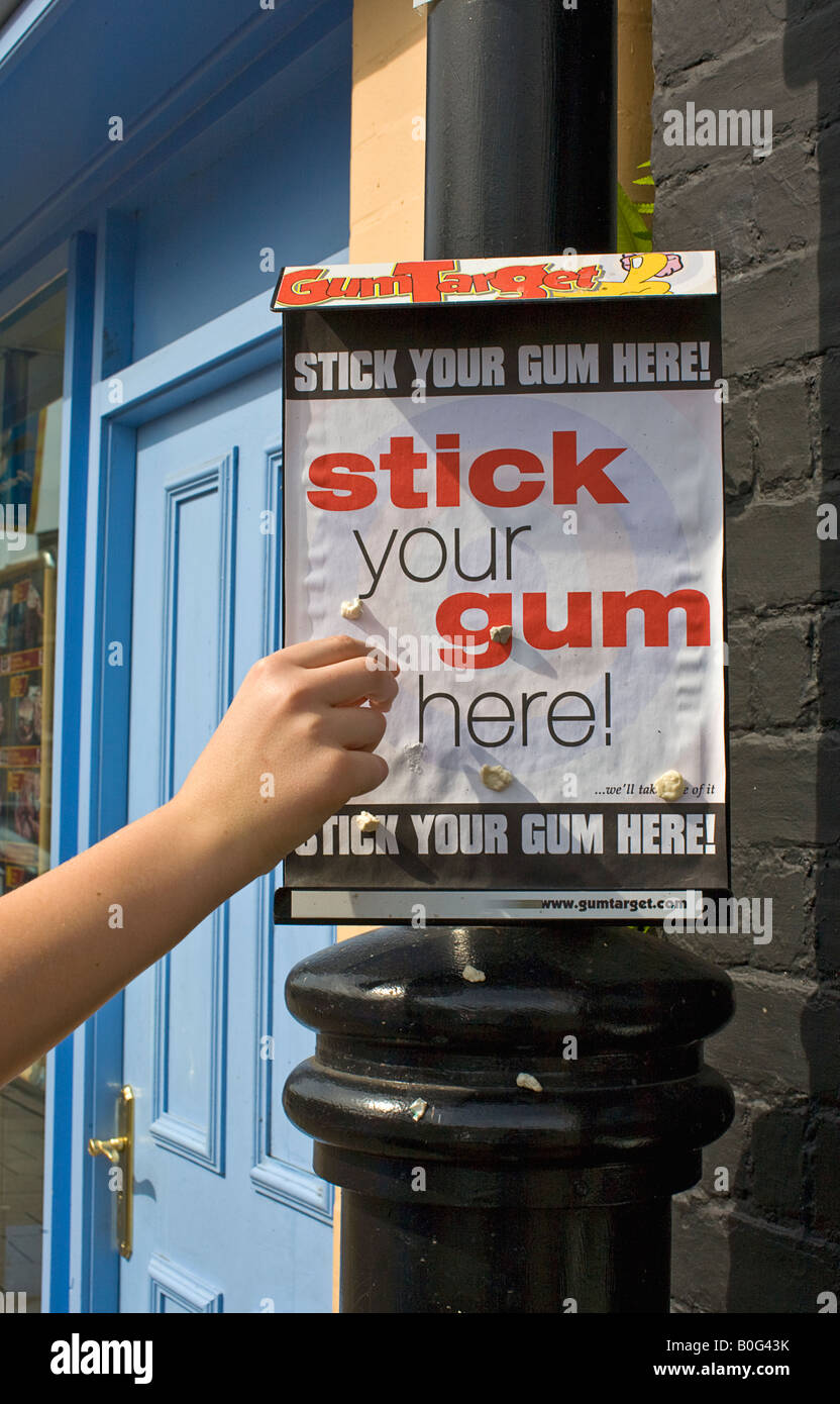 A board with removable sheets for people to stick their used gum on ...