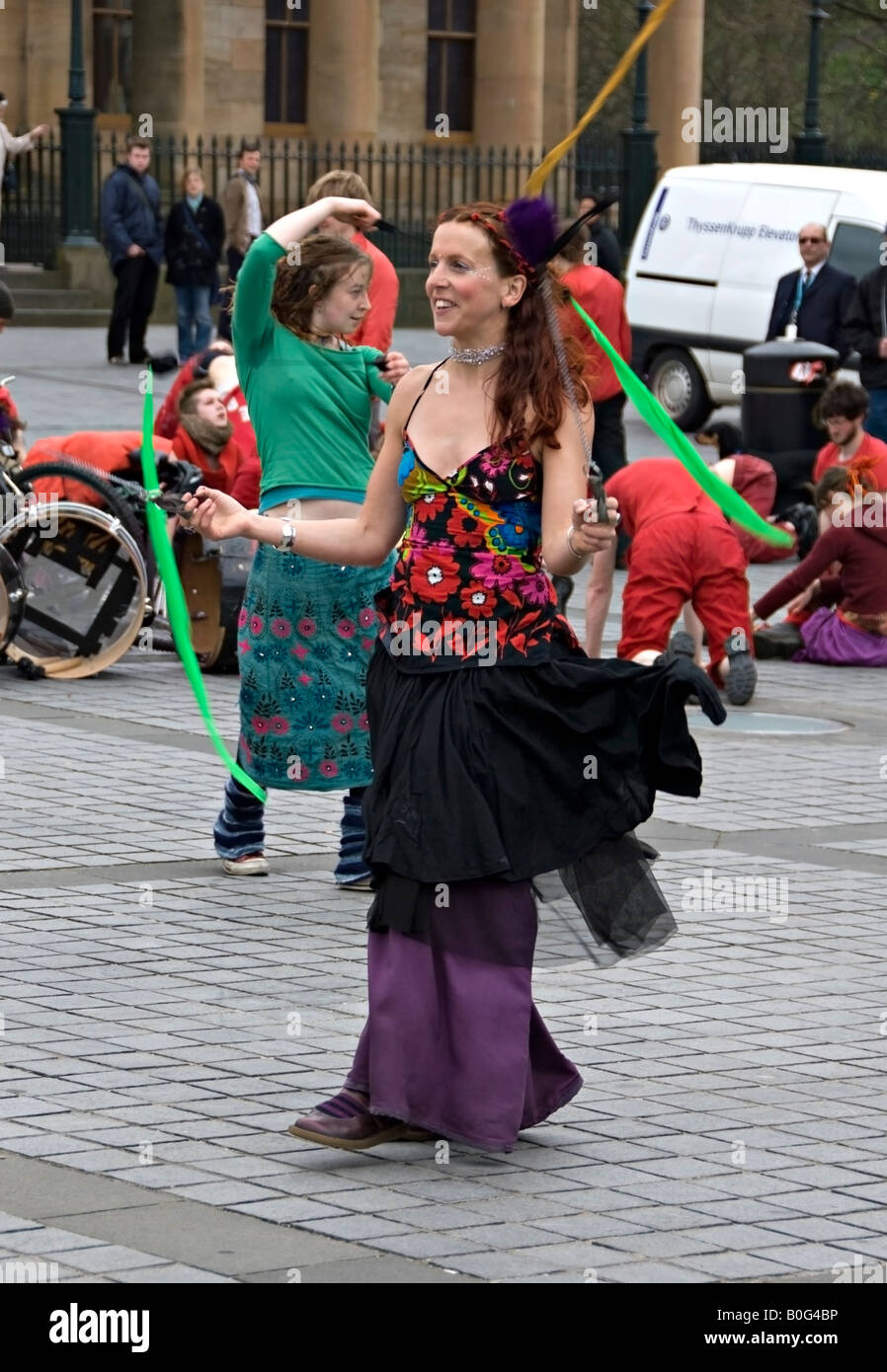 Students performing hippy dance routines on The Mound, Edinburgh Stock ...