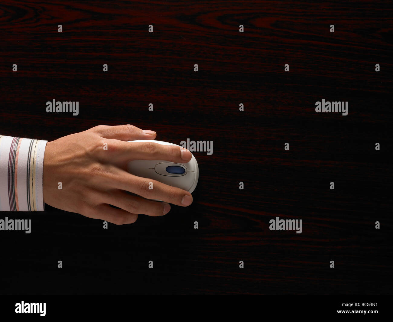 A hand using computer mouse Stock Photo - Alamy