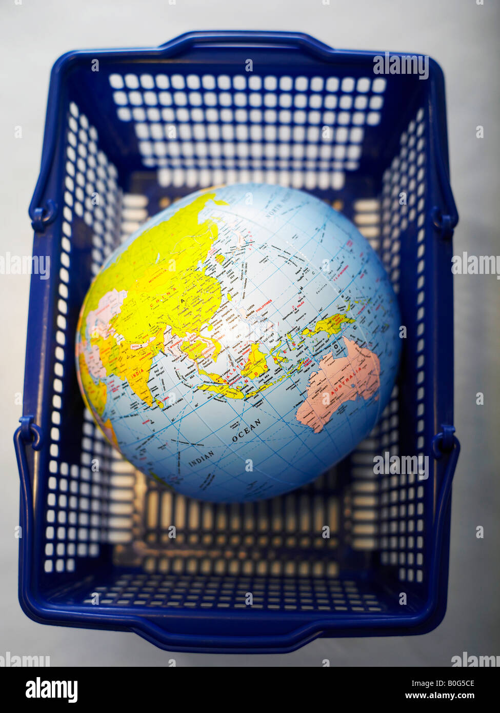 A basket with a globe Stock Photo - Alamy