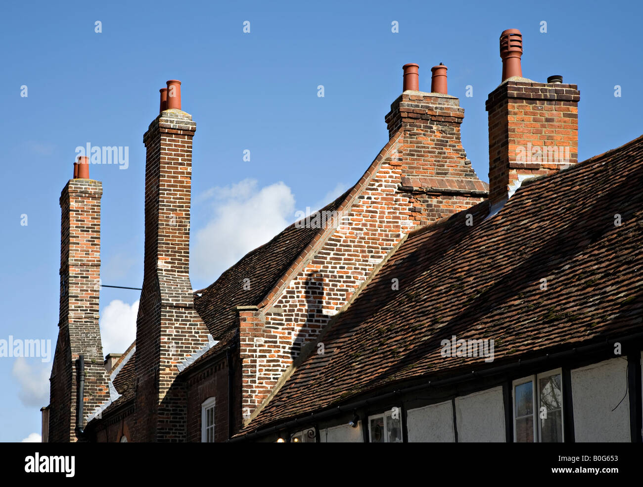 Tall brick chimneys on the old King James I palace in Royston England ...