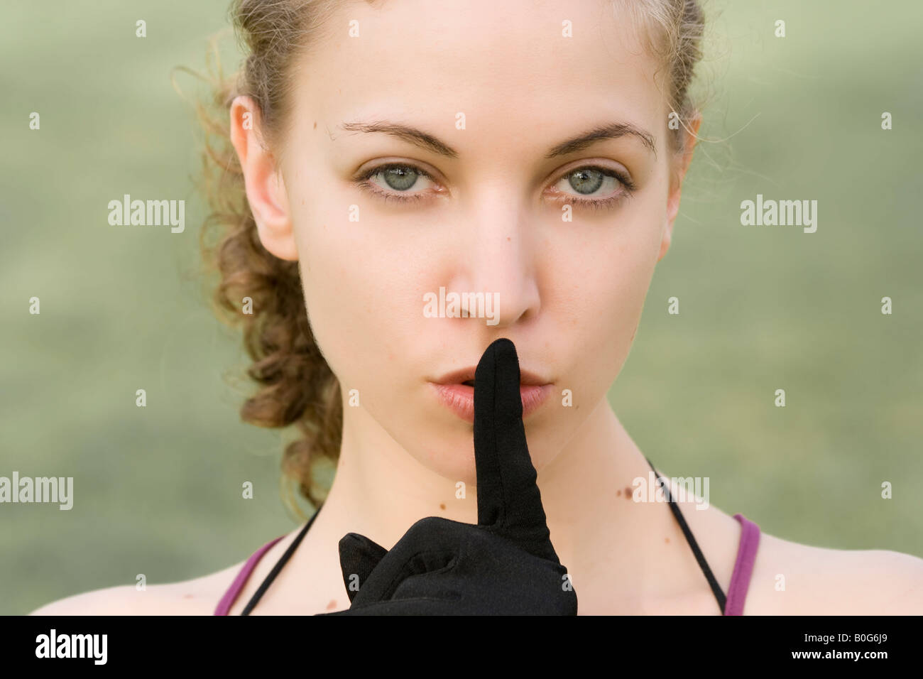 silence girl glove caucasian portrait Stock Photo - Alamy