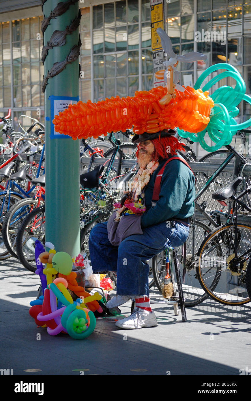 The Ballon man napping in Pike Place Market in Seattle Stock Photo - Alamy