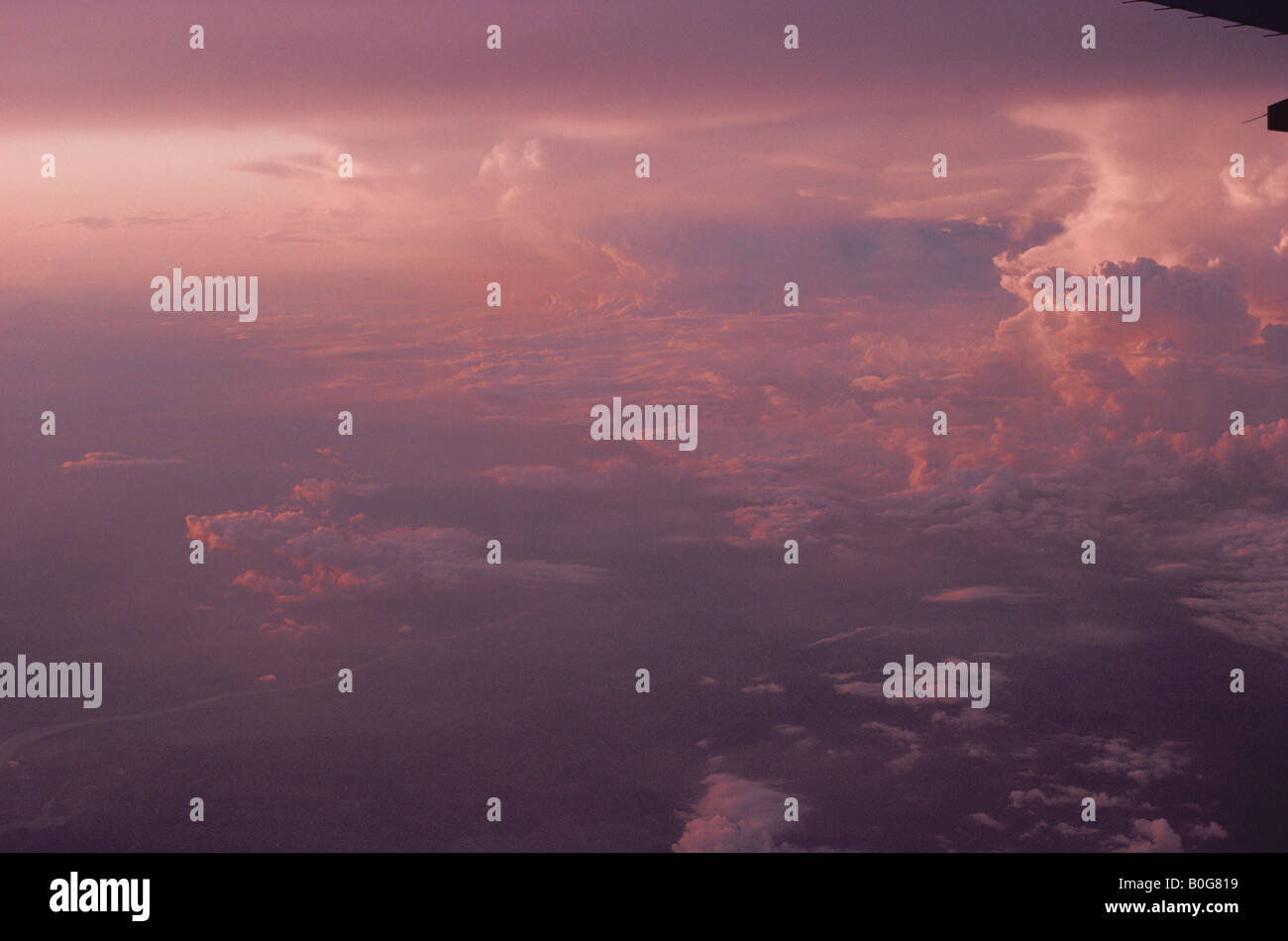 Sunset On Clouds Stock Photo - Alamy