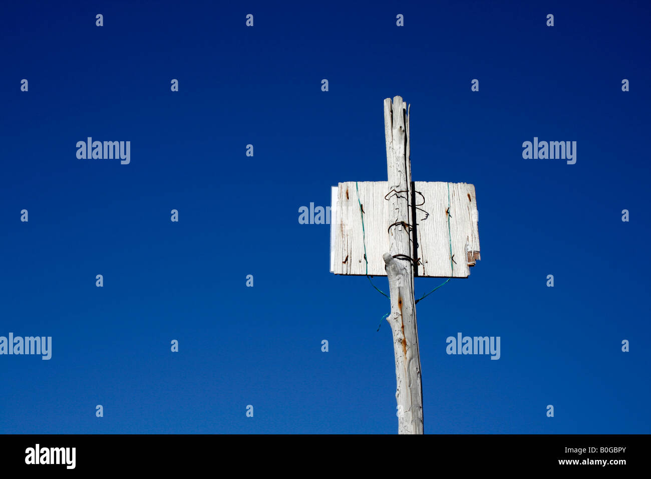 old empty sign post and blue sky Stock Photo - Alamy