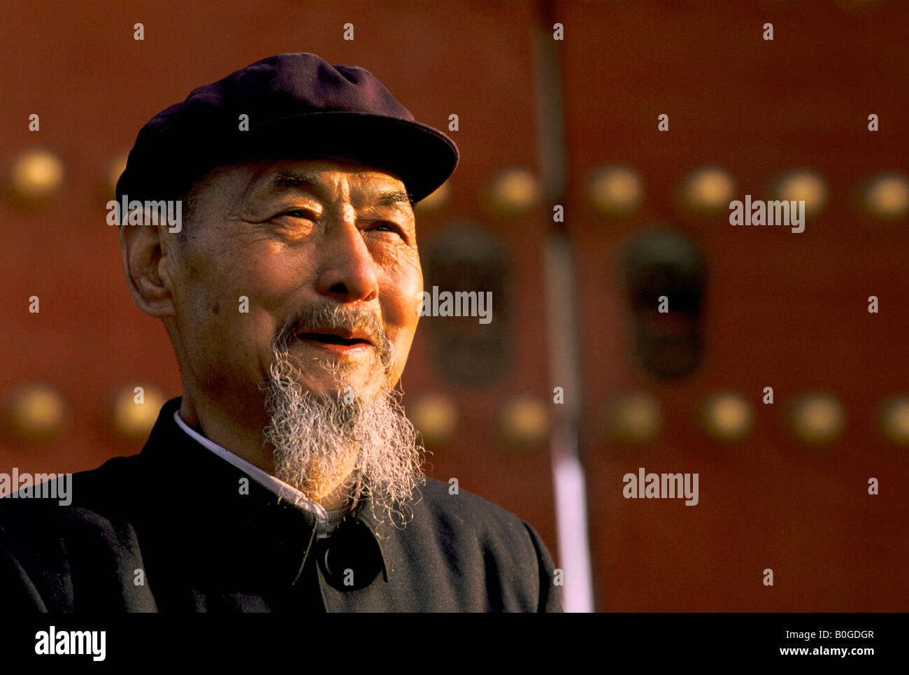 Portrait of an elderly man smiling, China Stock Photo - Alamy