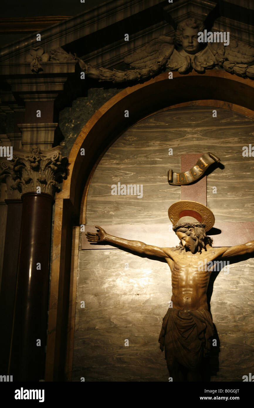 jesus on cross statue in church in rome italy Stock Photo - Alamy